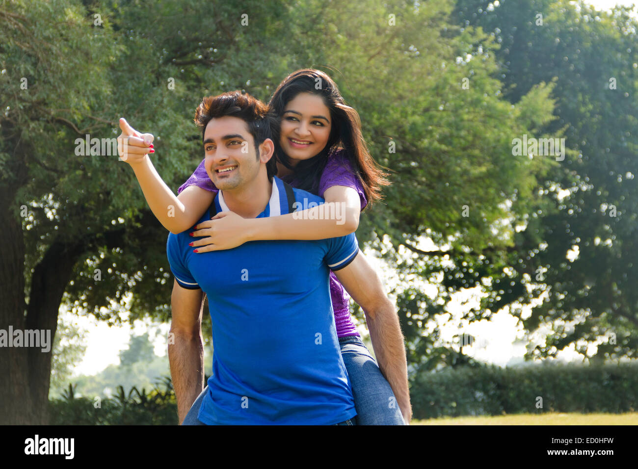 2 indian couple park enjoy Stock Photo - Alamy