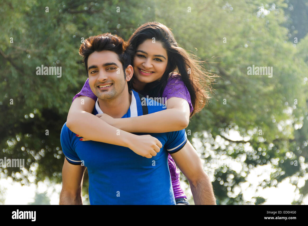 2 indian couple park enjoy Stock Photo - Alamy