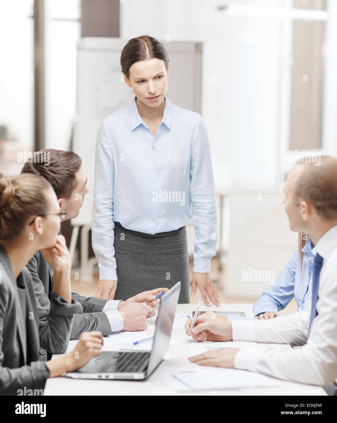 strict female boss talking to business team Stock Photo - Alamy