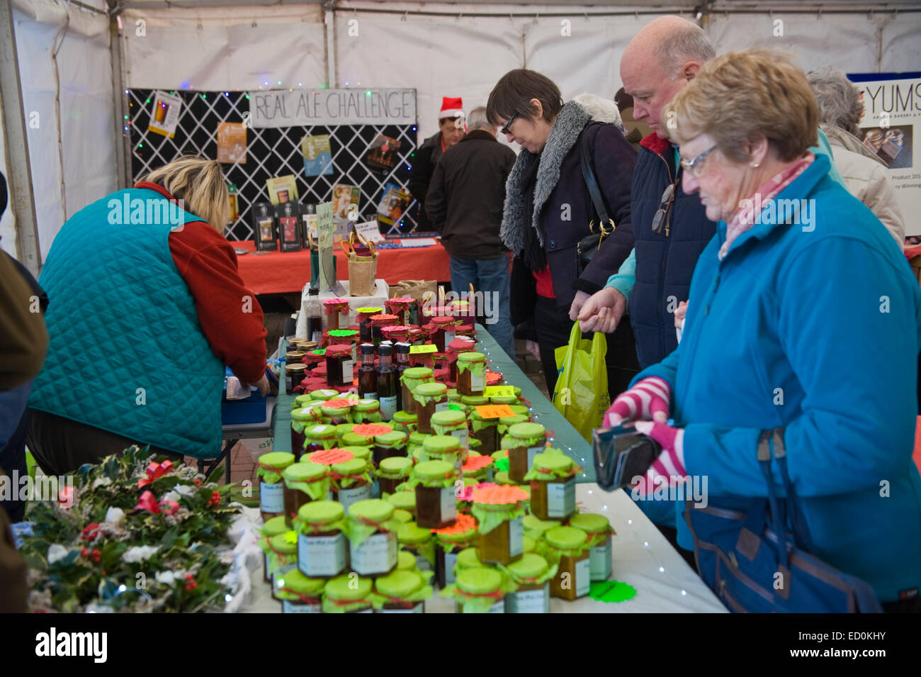 Stall selling locally made bottled preserves during food festival at ...