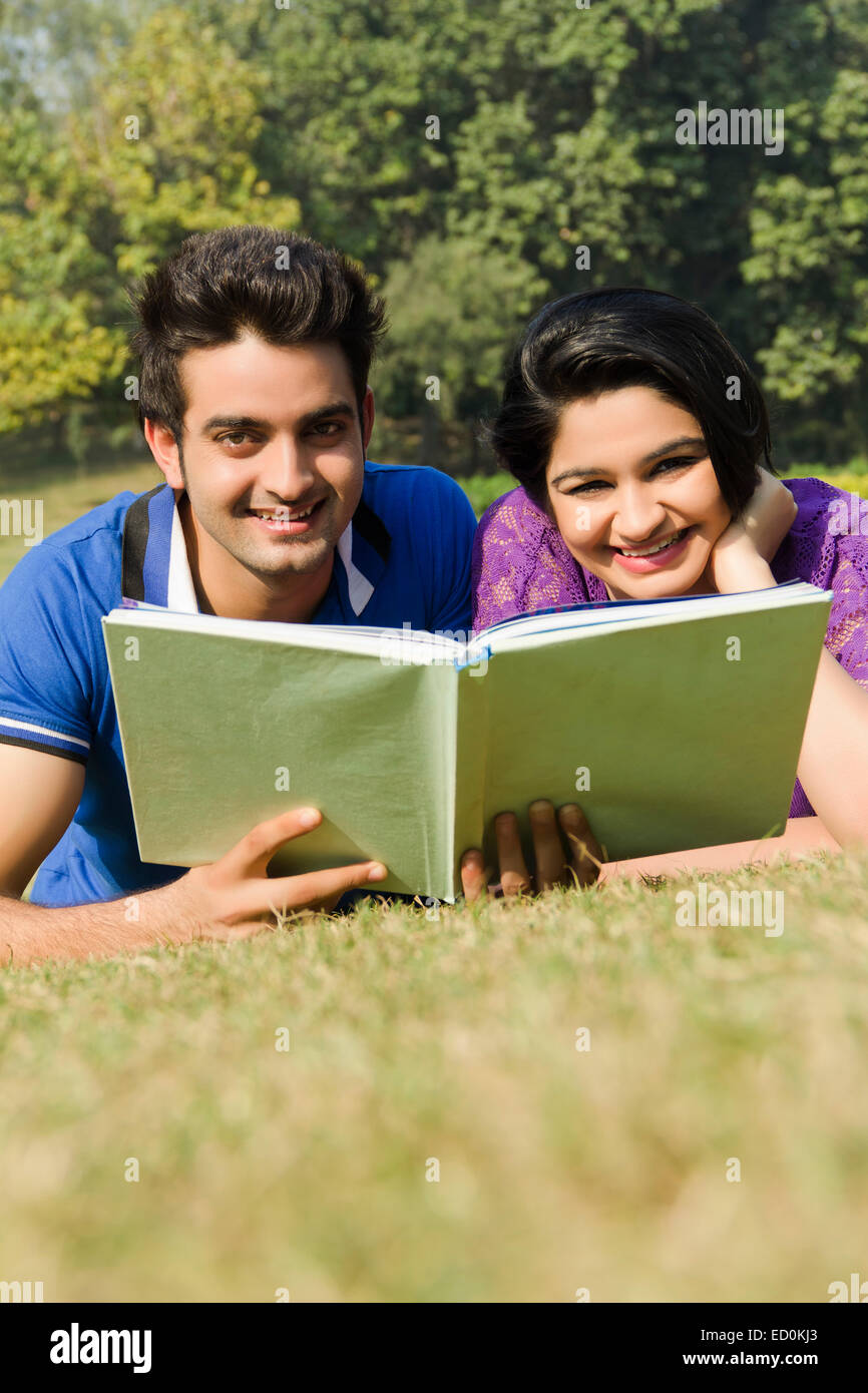 Indian college couple park book hi-res stock photography and images - Alamy