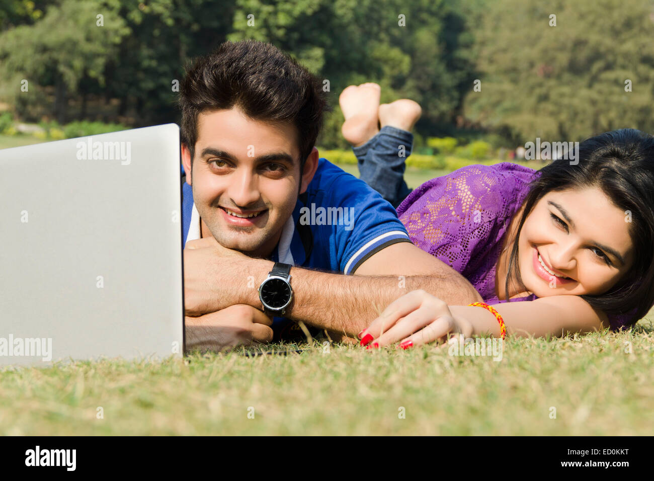 Indian college couple park book hi-res stock photography and images - Alamy