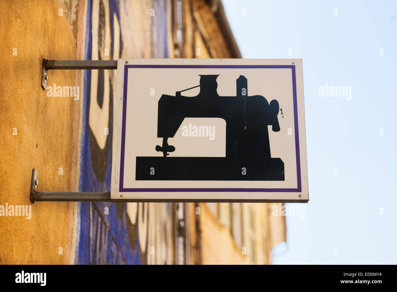 sign board for shop repairing clothes Stock Photo - Alamy