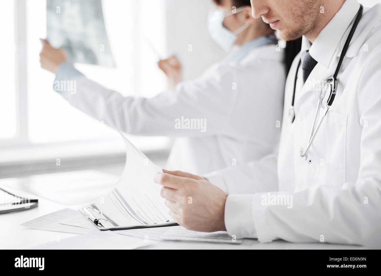 two doctors looking at x-ray Stock Photo - Alamy