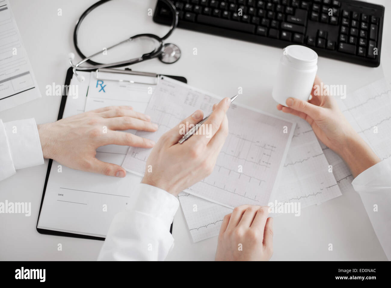 two doctors prescribing medication Stock Photo - Alamy