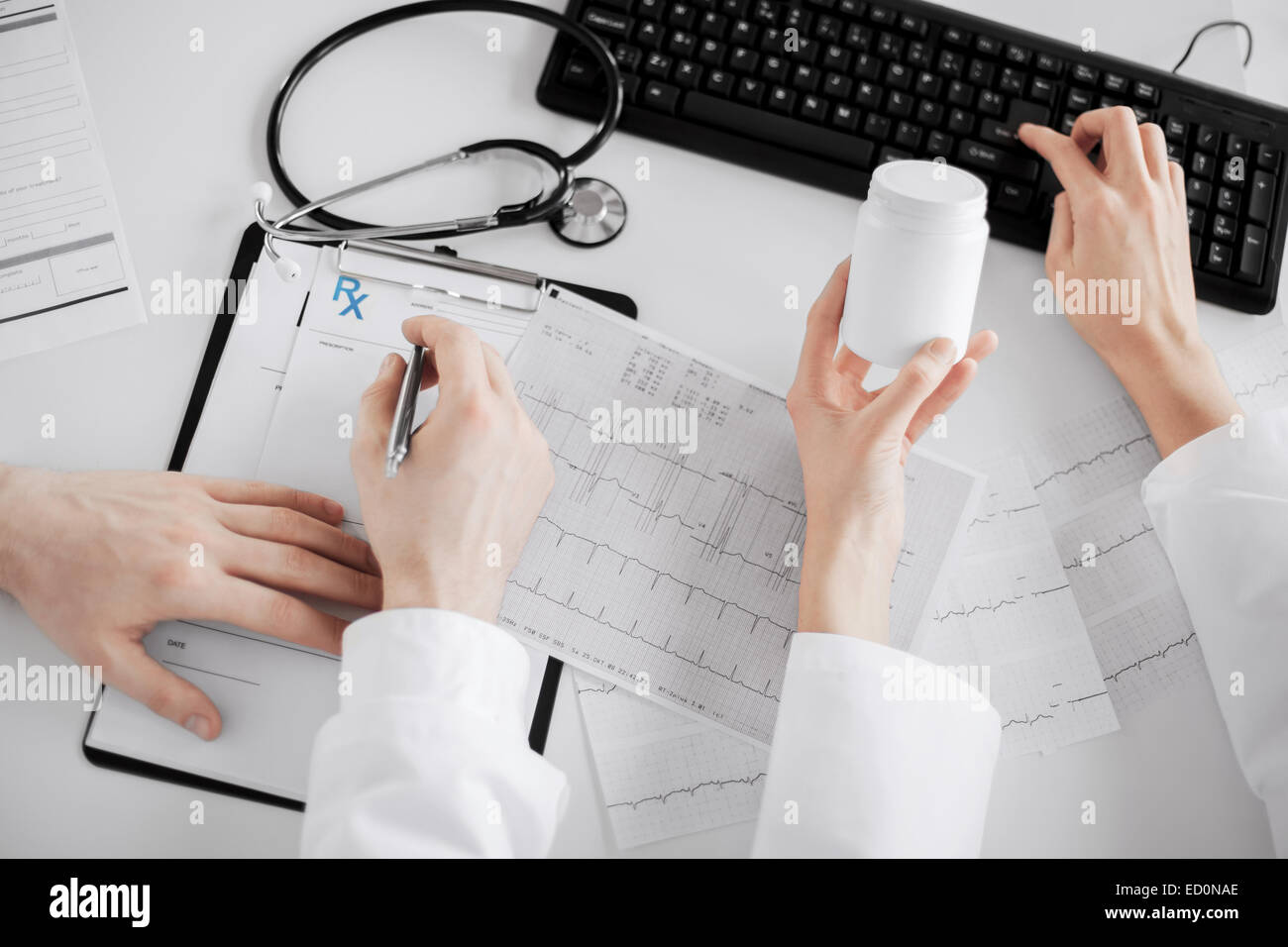 two doctors prescribing medication Stock Photo - Alamy