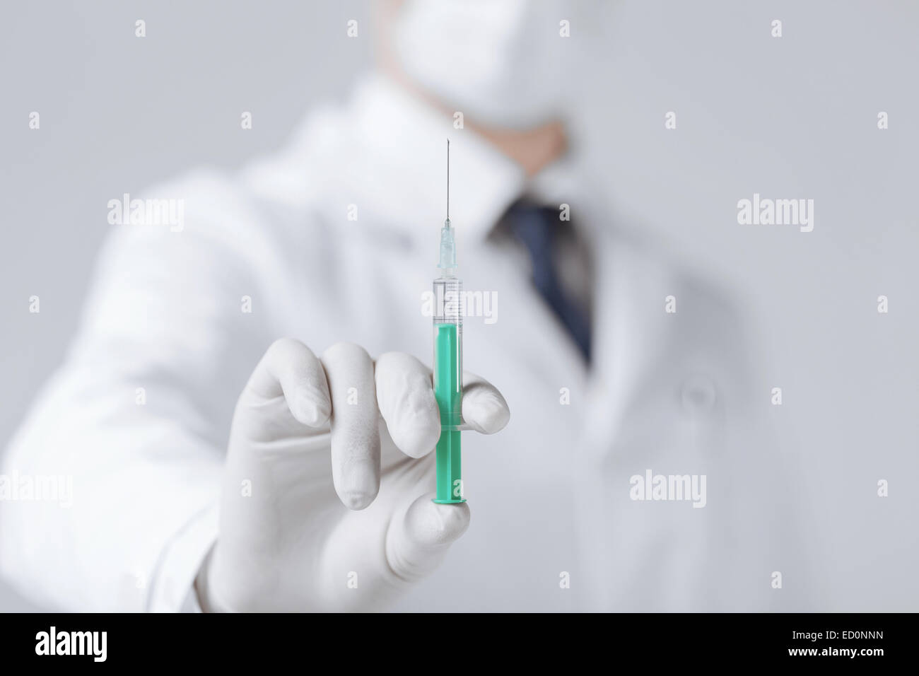 male doctor holding syringe with injection Stock Photo - Alamy