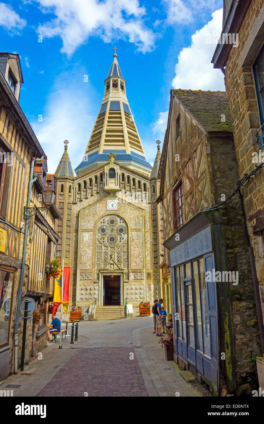Narrow street with conical church tower, Domfront, Normandy France ...