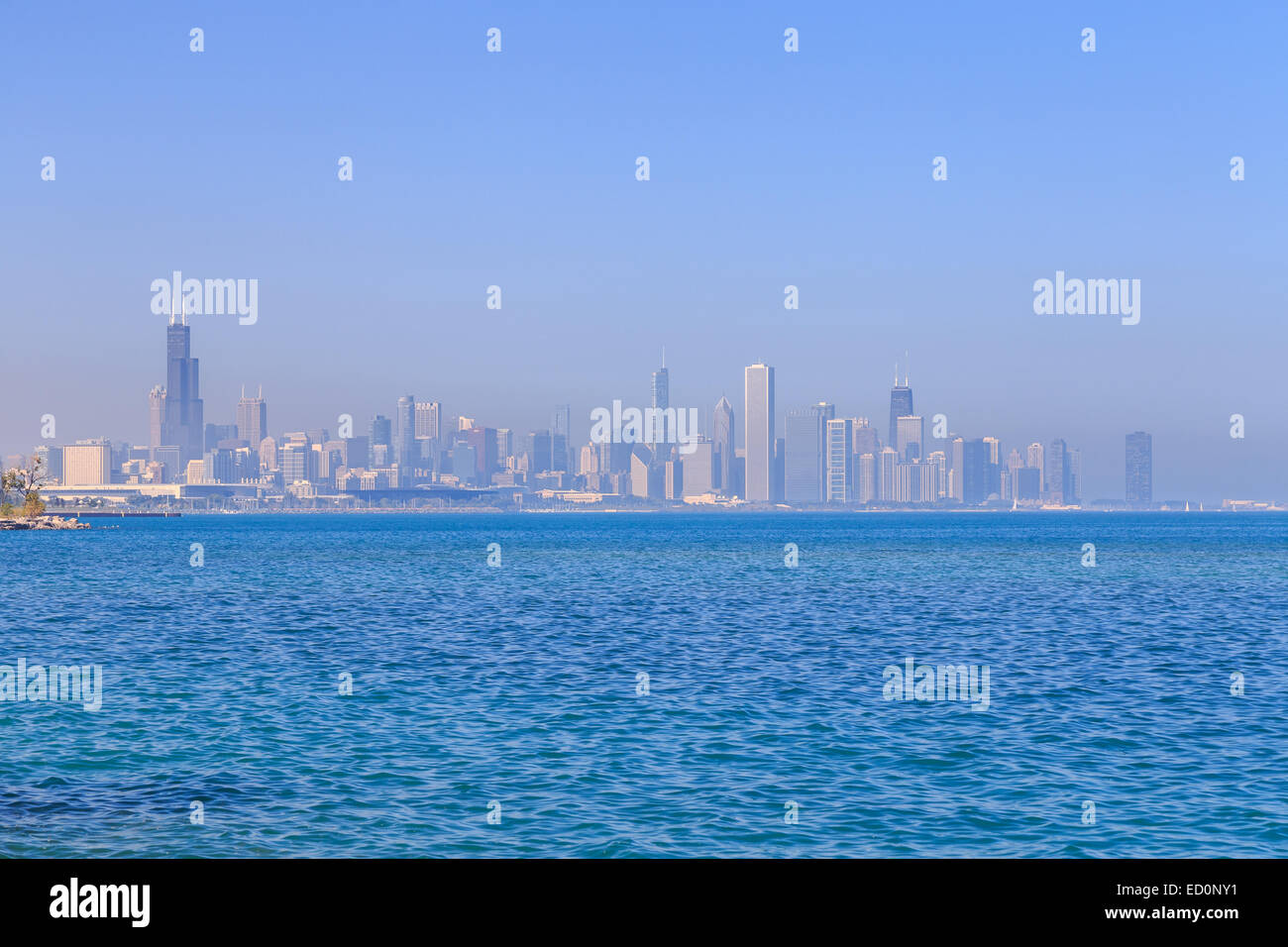 Downtown Chicago skyline seen through the haze past Lake Michigan from ...