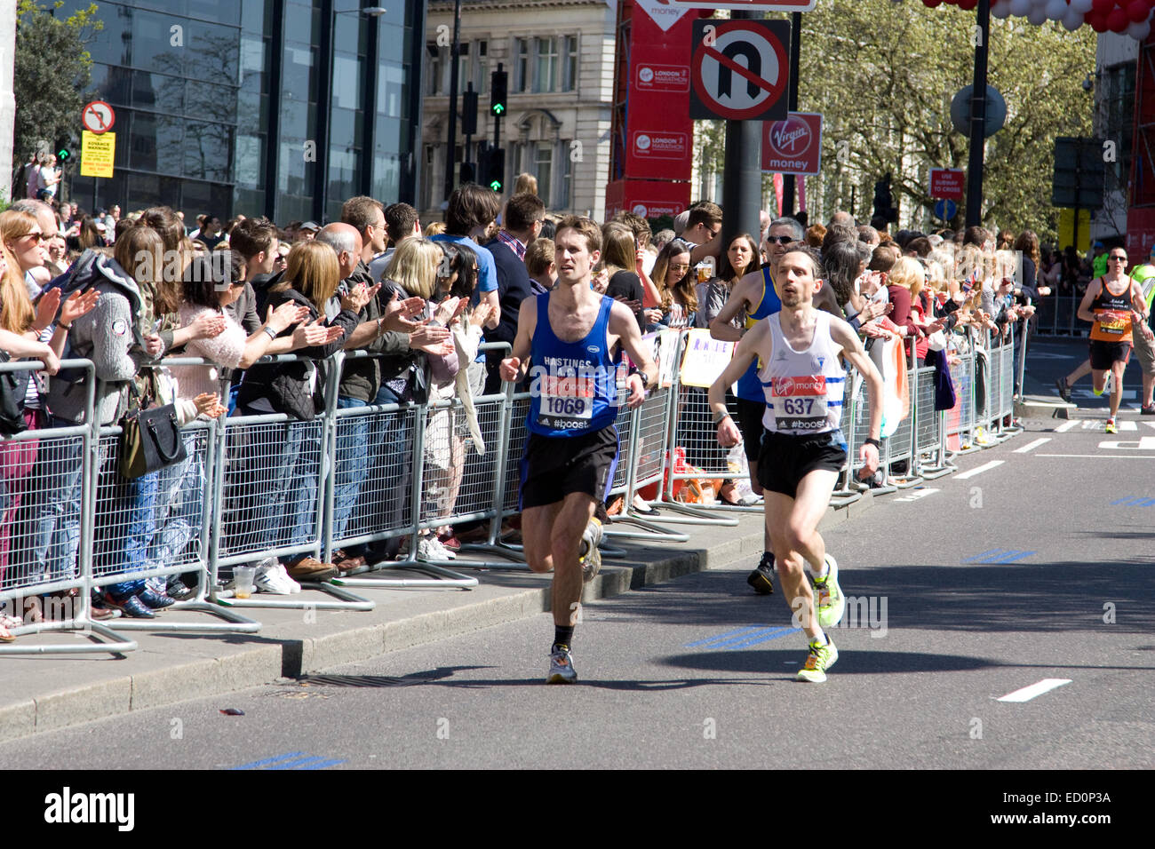 LONDON - APRIL 13: Unidentified men run the London marathon on April 13 ...