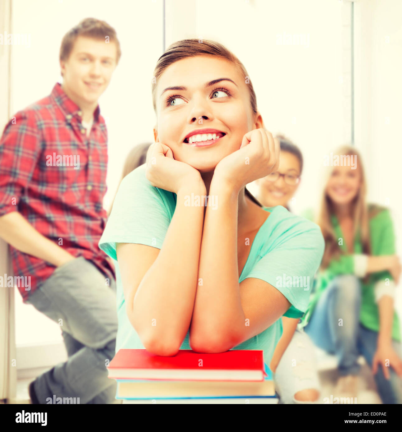 happy smiling student girl with books at school Stock Photo - Alamy