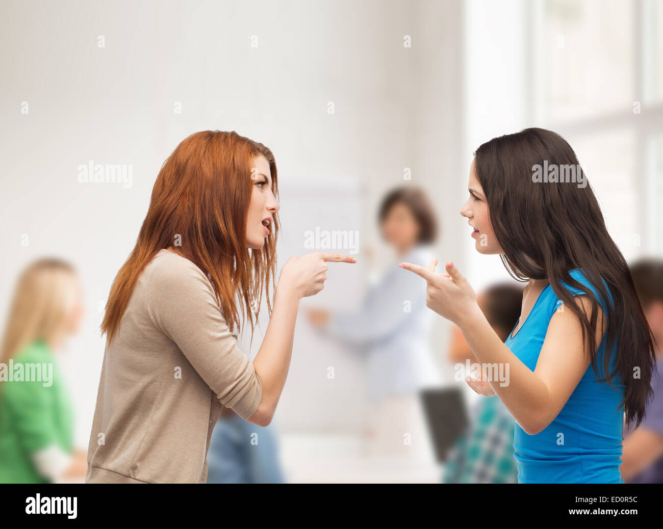 two teenagers having a fight at school Stock Photo - Alamy