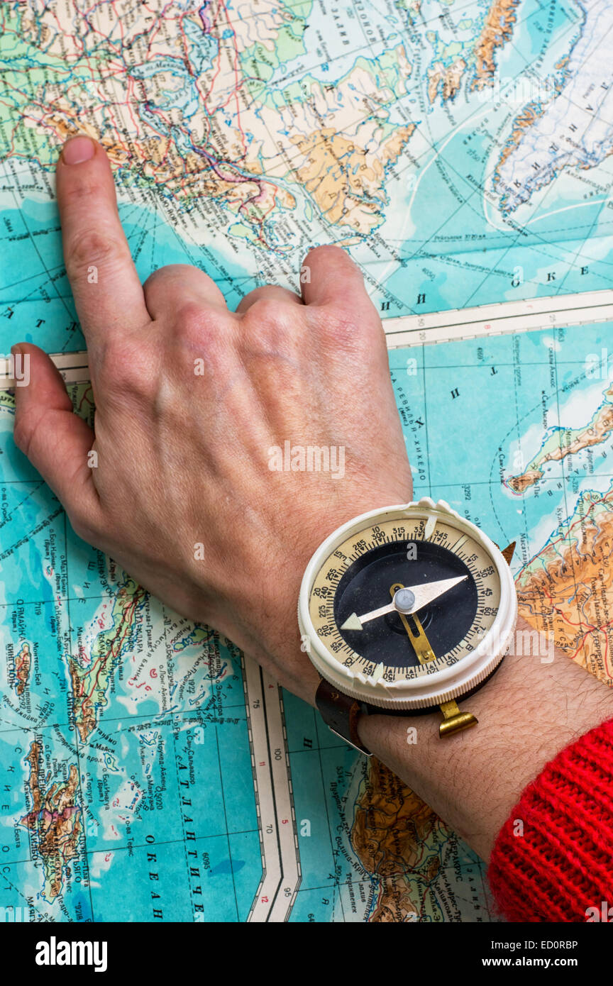 hand to indicate the route on topographic map Stock Photo - Alamy