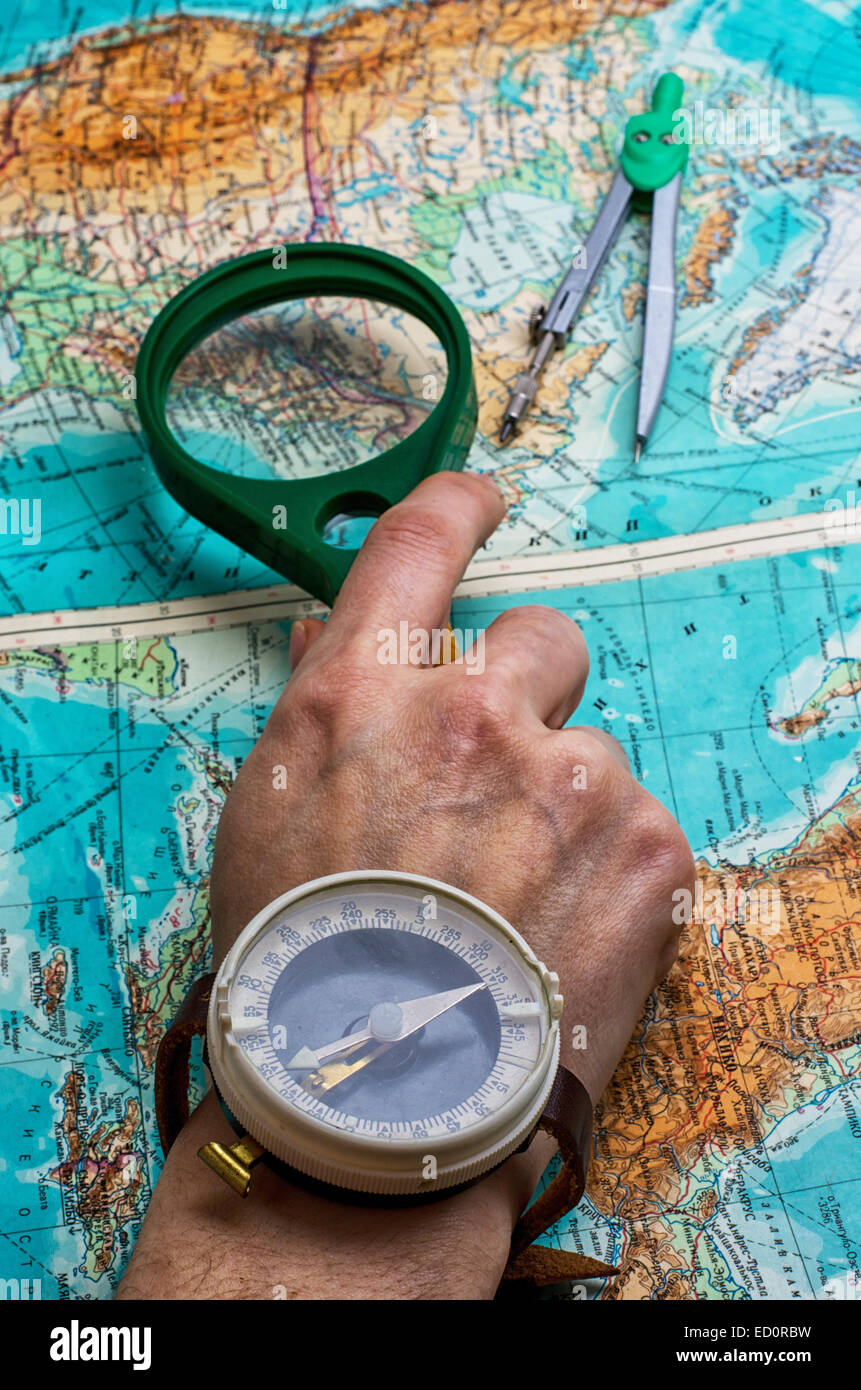 hand to indicate the route on topographic map Stock Photo - Alamy