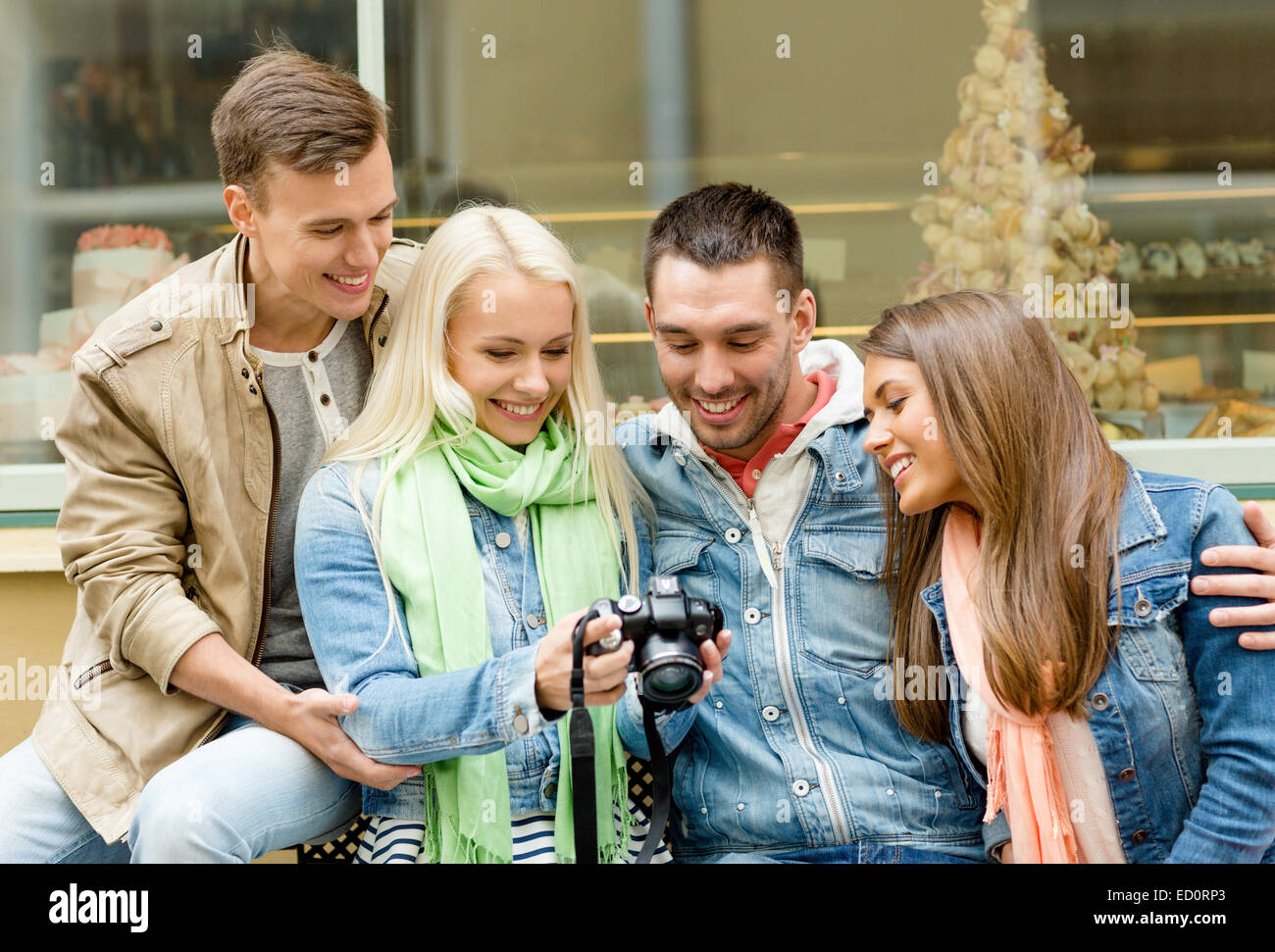 group of smiling friends with digital photocamera Stock Photo - Alamy
