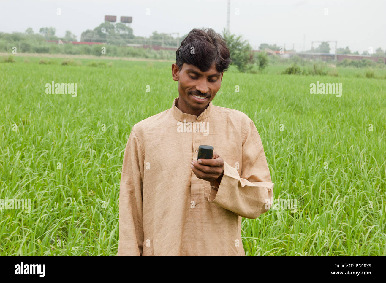 Indian farmer plant phone hi-res stock photography and images - Alamy