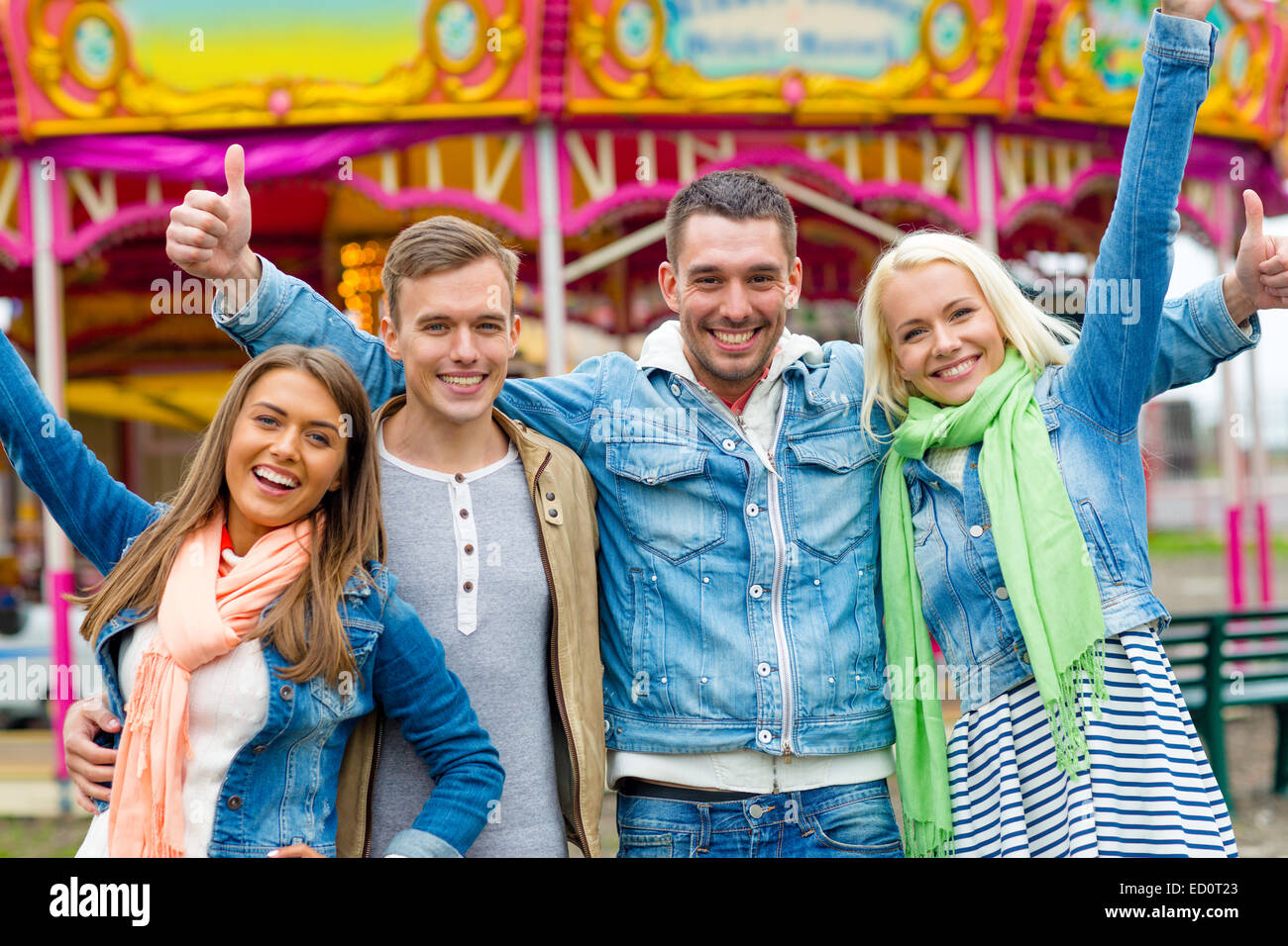 group of smiling friends showing thumbs up Stock Photo - Alamy