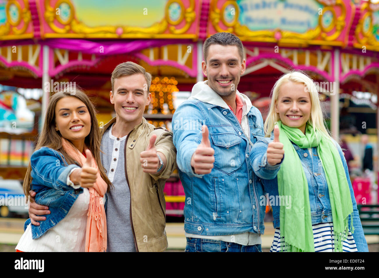 group of smiling friends showing thumbs up Stock Photo - Alamy