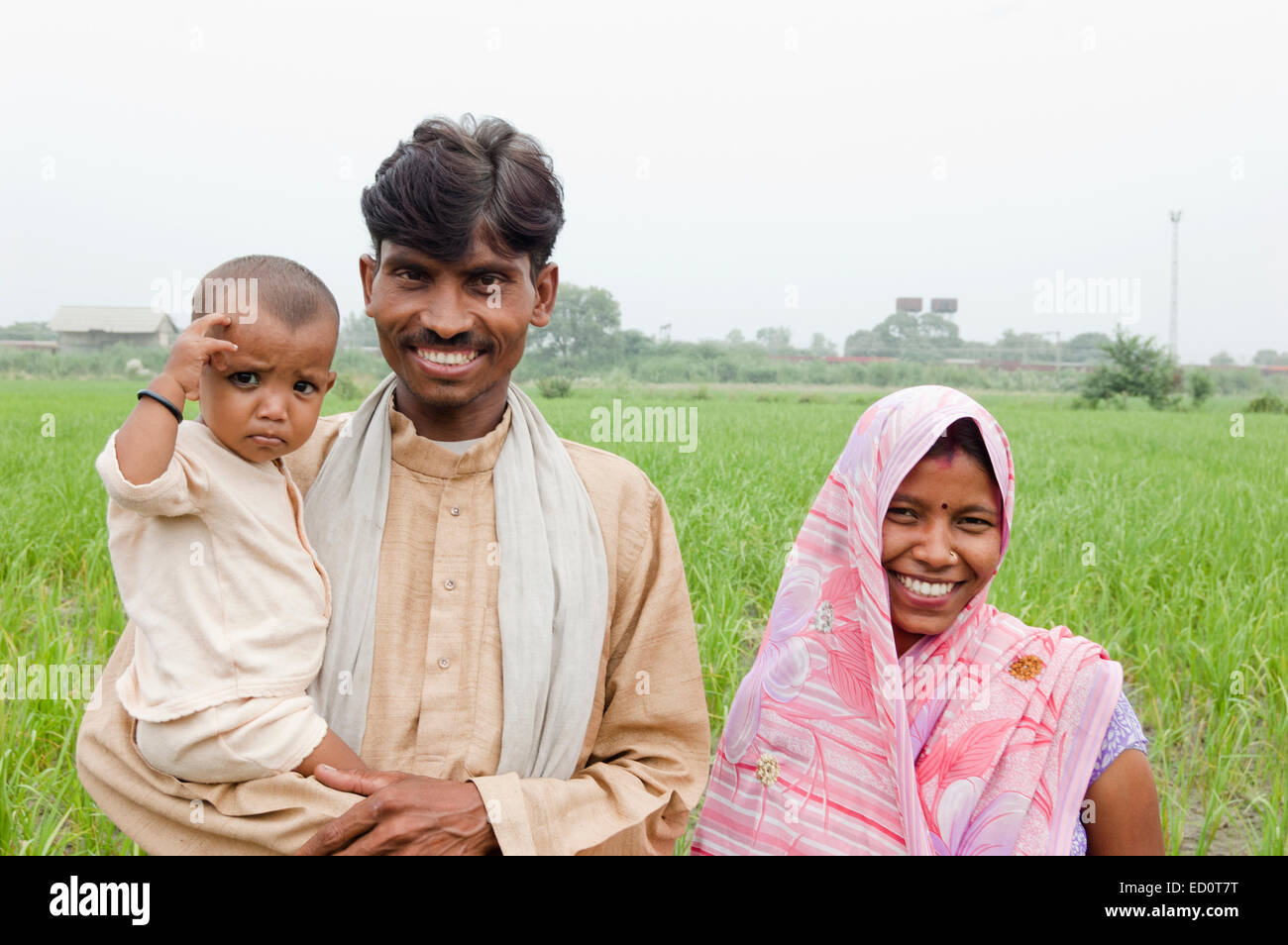 indian rural Parents with child Field Stock Photo - Alamy