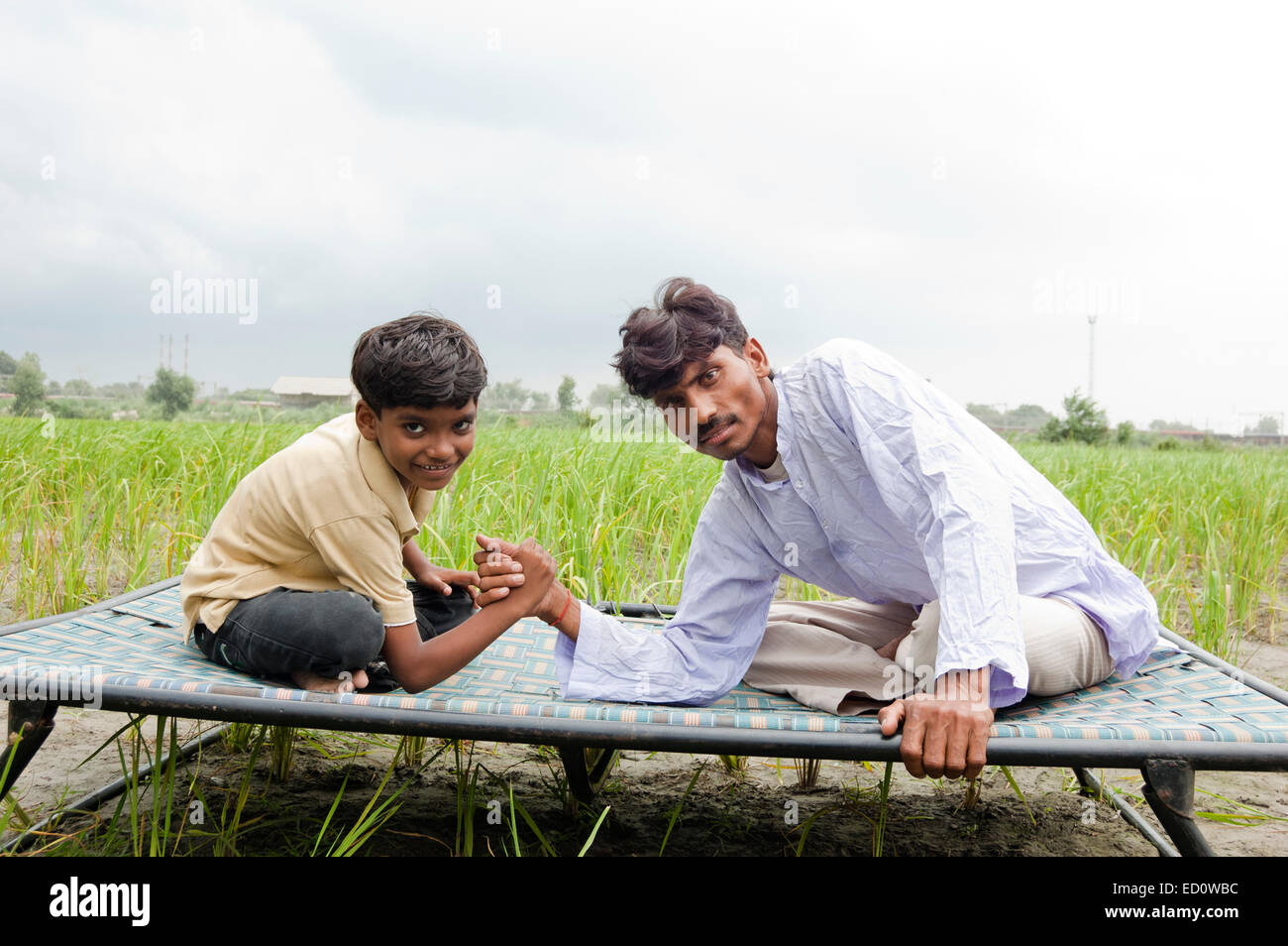 indian rural father with child Fighting Challenge Stock Photo - Alamy