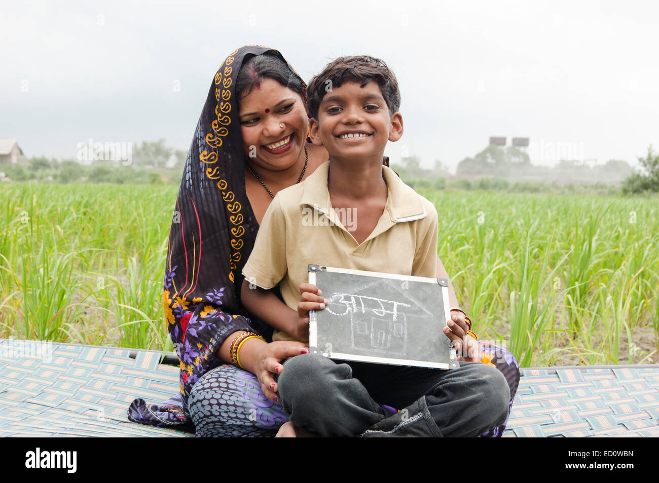 Indian rural mother child study hi-res stock photography and images - Alamy