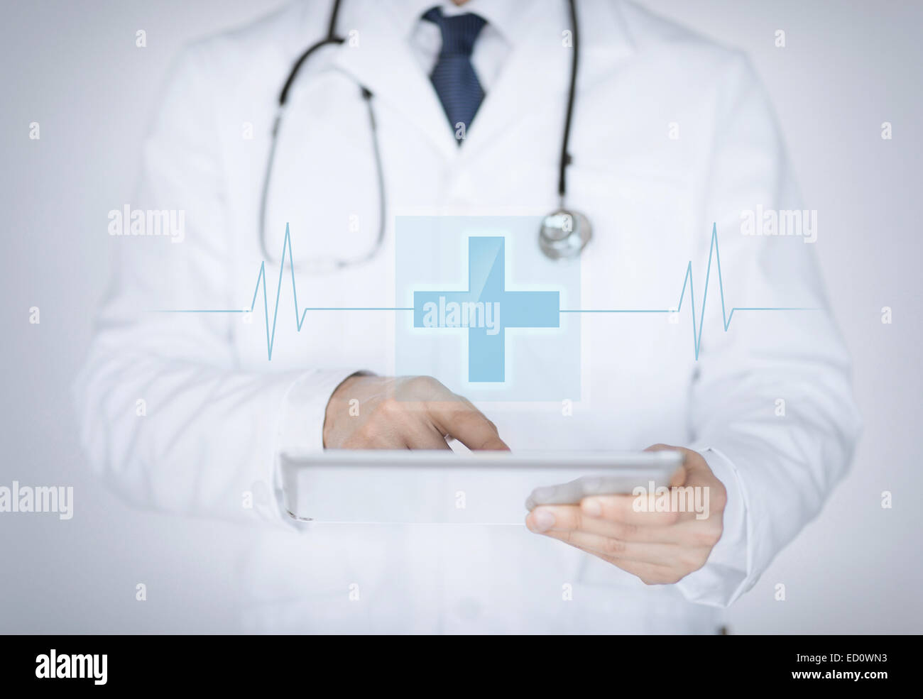 male doctor holding tablet pc with medical app Stock Photo - Alamy
