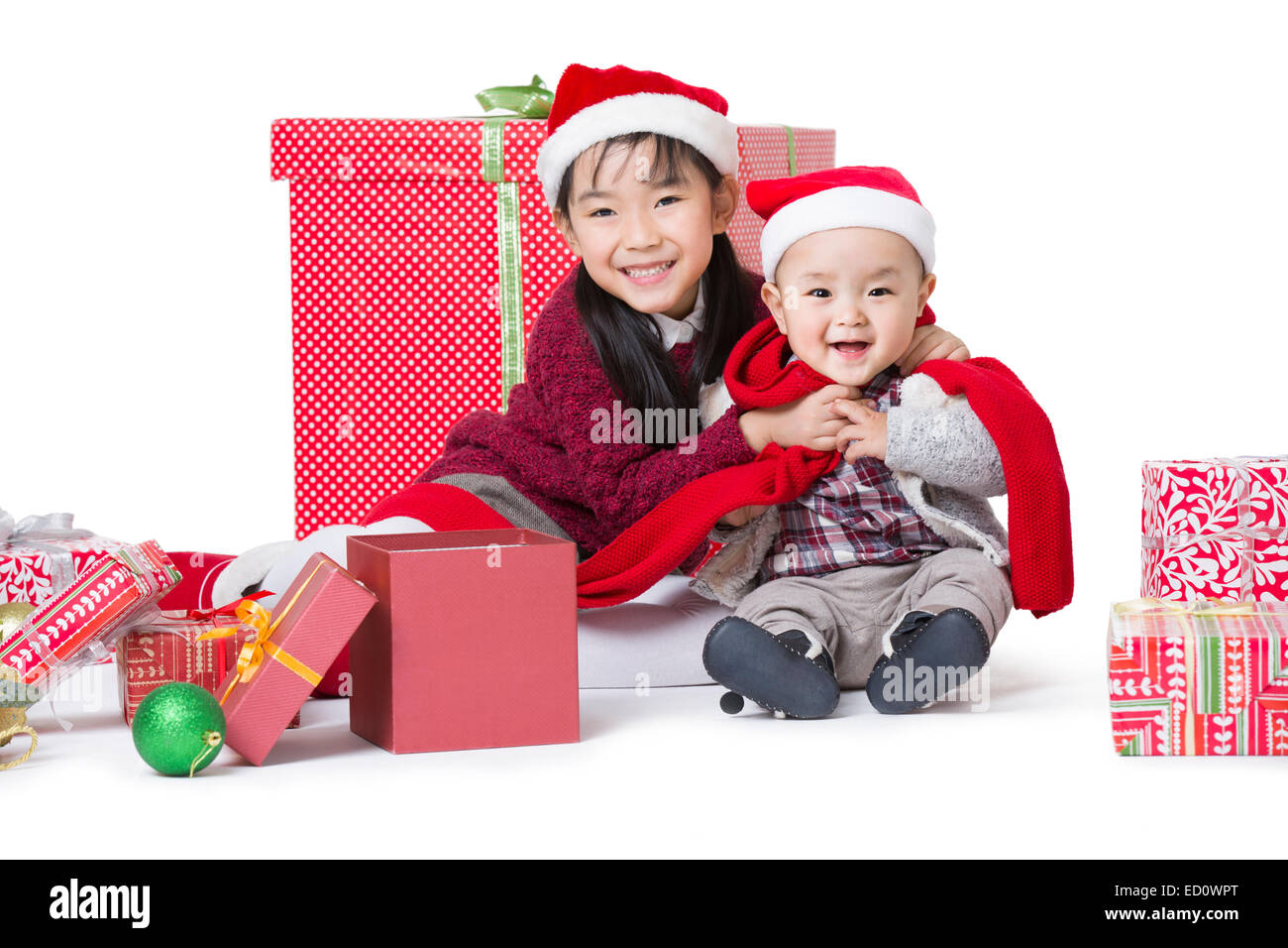 Christmas children child holding Cut Out Stock Images & Pictures - Alamy