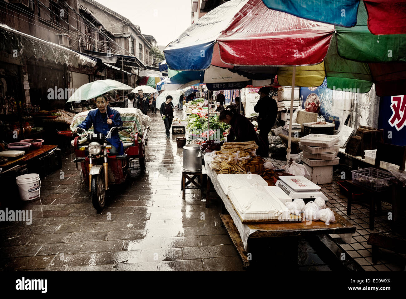 Street food market during rain in Zhangjiajie, Hunan, China 2014 Stock ...