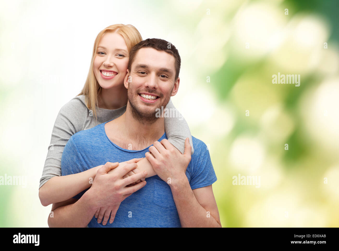 smiling couple hugging Stock Photo - Alamy