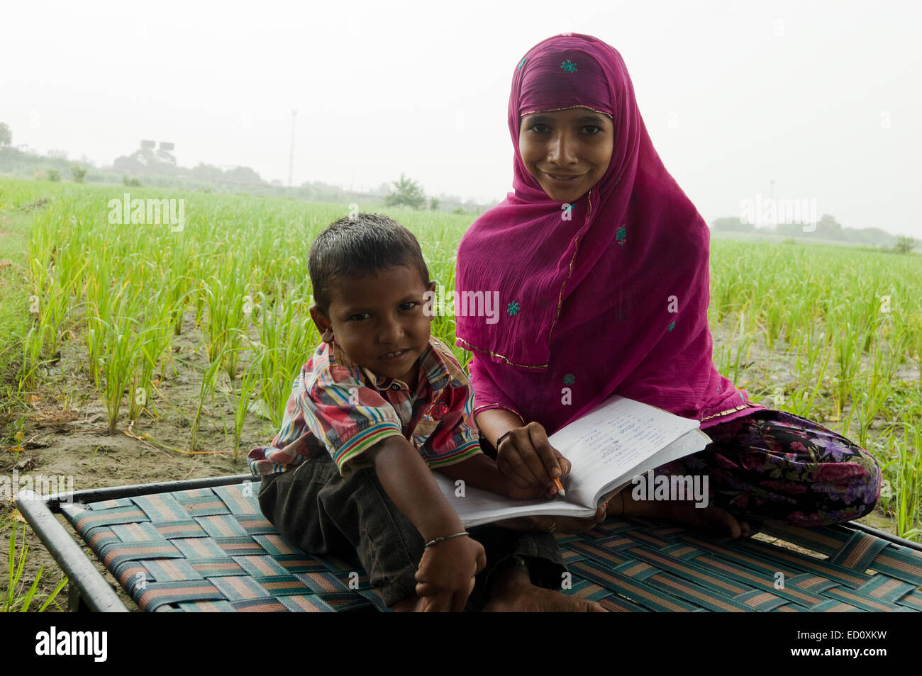 indian rural girl Teaching child Stock Photo - Alamy