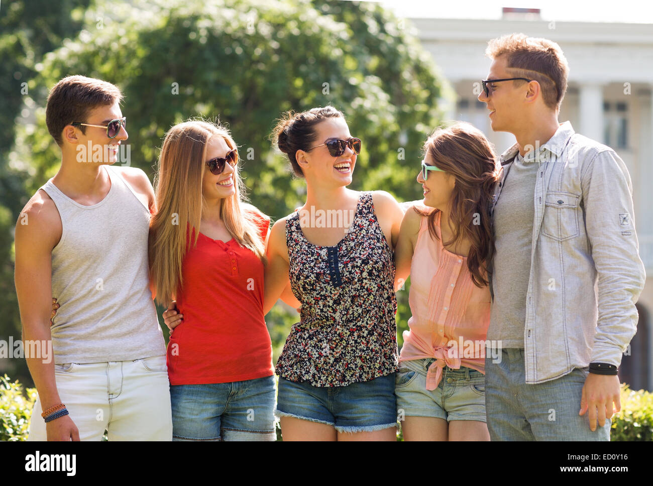 group of smiling friends outdoors Stock Photo - Alamy