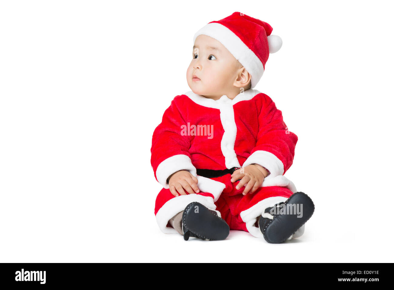 Cute baby in Santa suit Stock Photo - Alamy