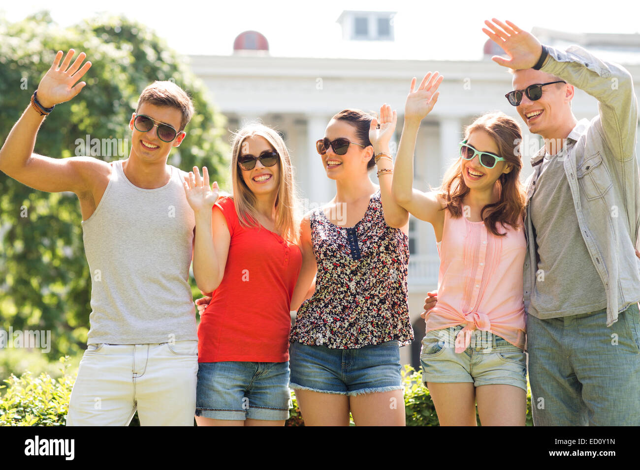 Group of travelers waving hi-res stock photography and images - Alamy