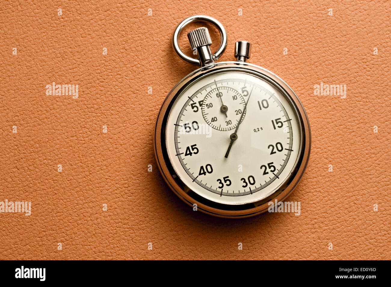 Stopwatch isolated on the paper background Stock Photo - Alamy
