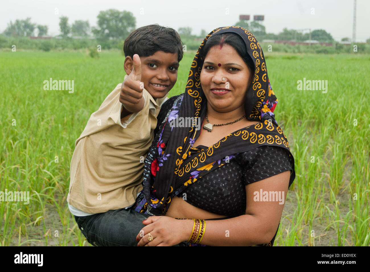 indian rural mother with child farm enjoy Stock Photo - Alamy