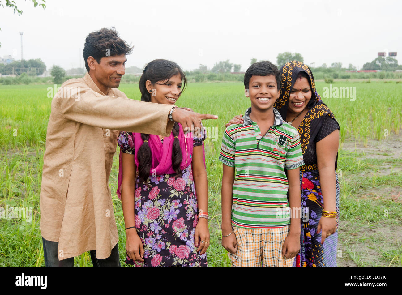 indian rural Parents and children showing farm Stock Photo - Alamy