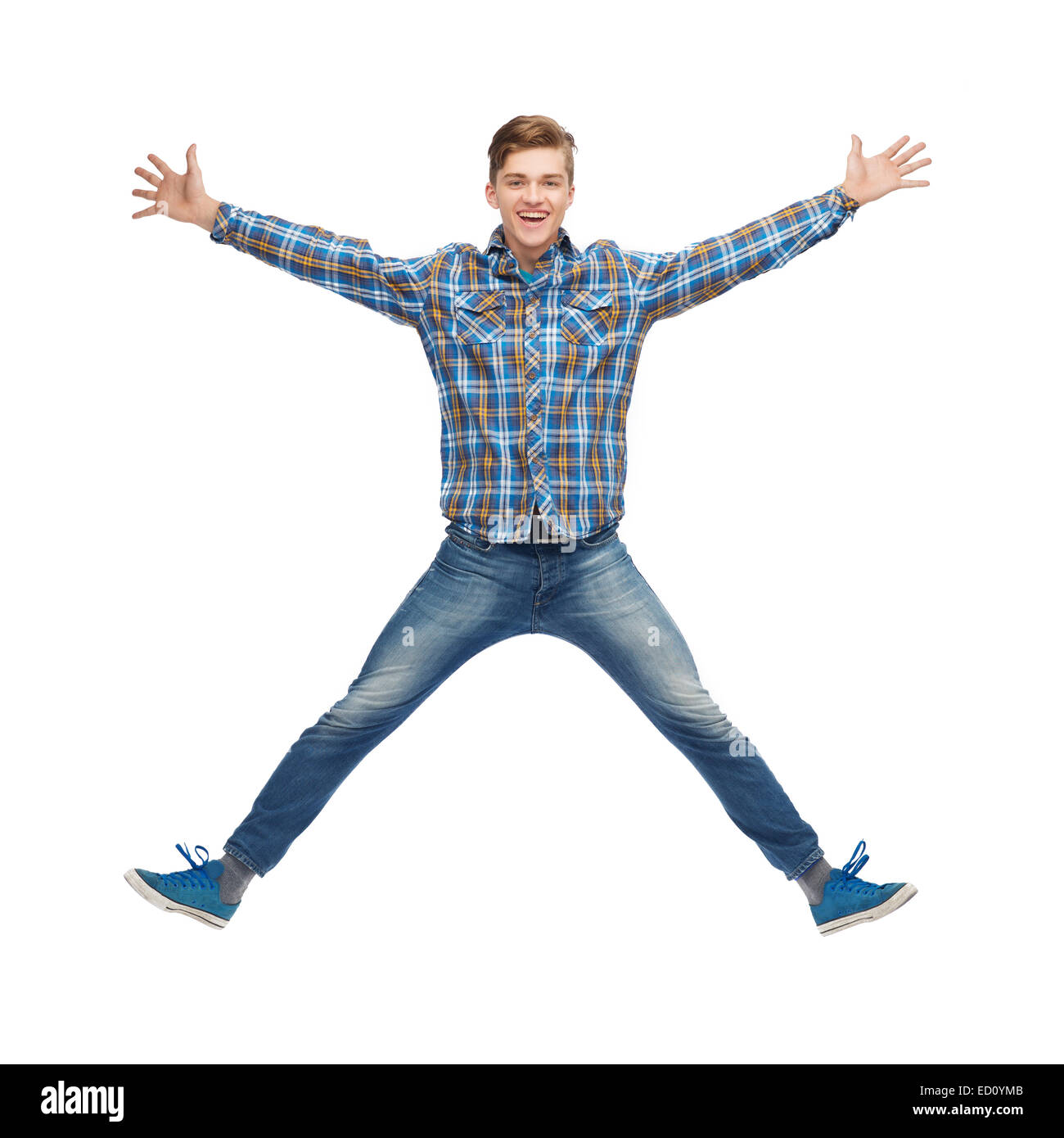 smiling young man jumping in air Stock Photo - Alamy