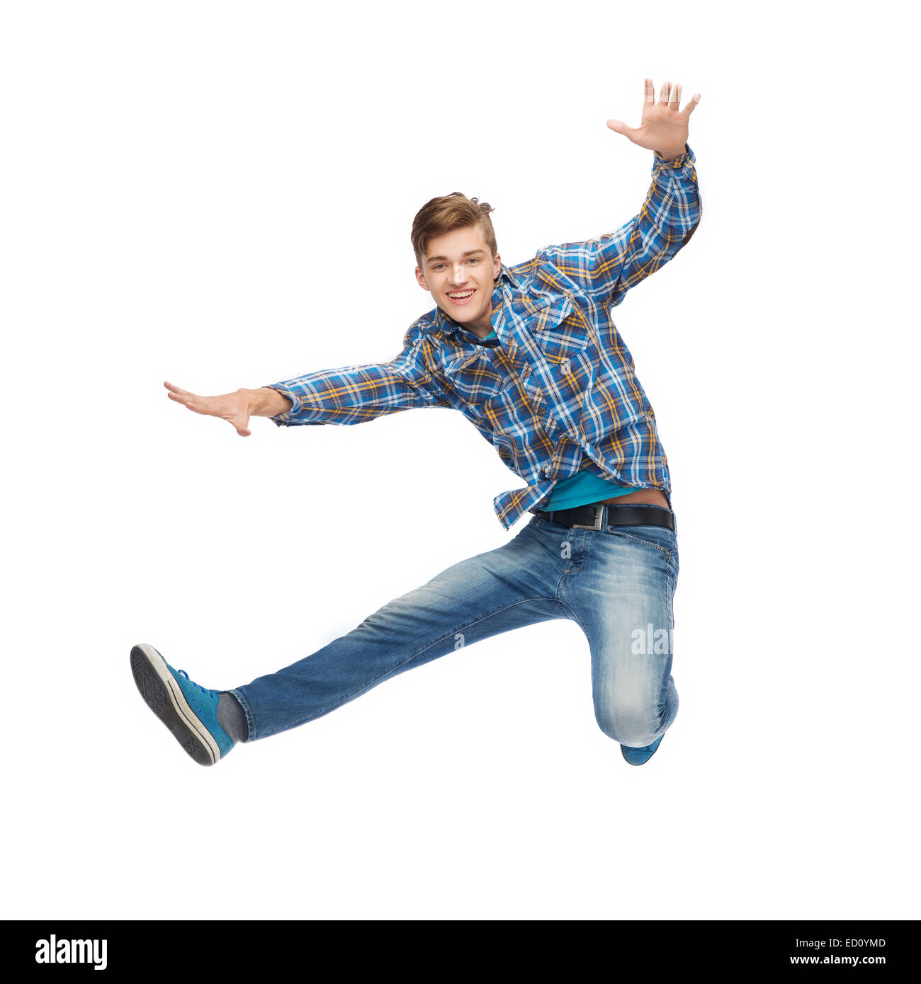 smiling young man jumping in air Stock Photo - Alamy