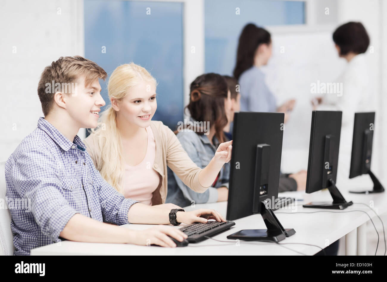 students with computer monitor at school Stock Photo - Alamy