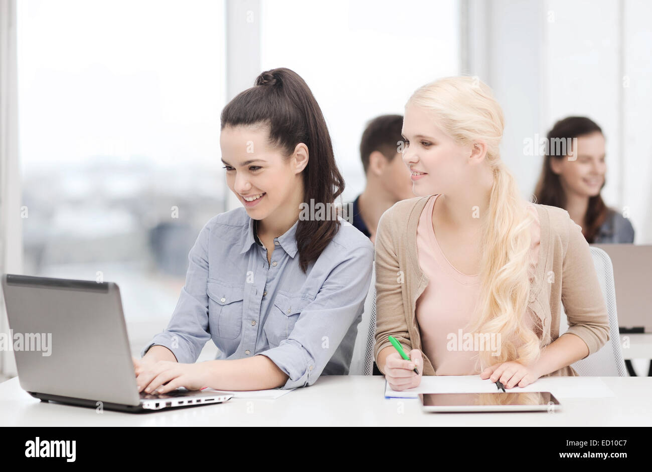 students with laptop, tablet pc and notebooks Stock Photo - Alamy