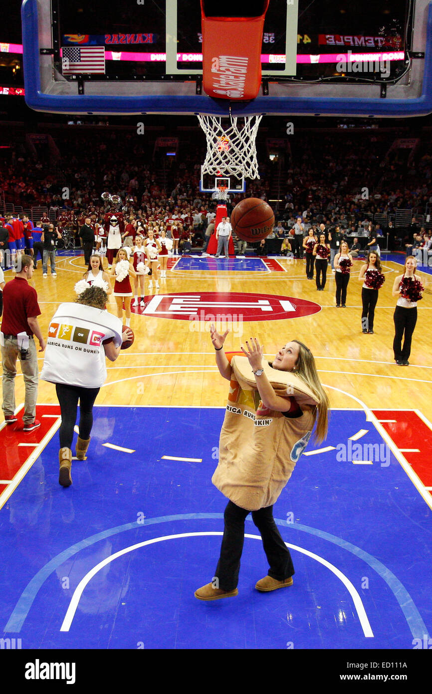 December 22, 2014: Fan in action during an on court Dunkin' Donuts ...