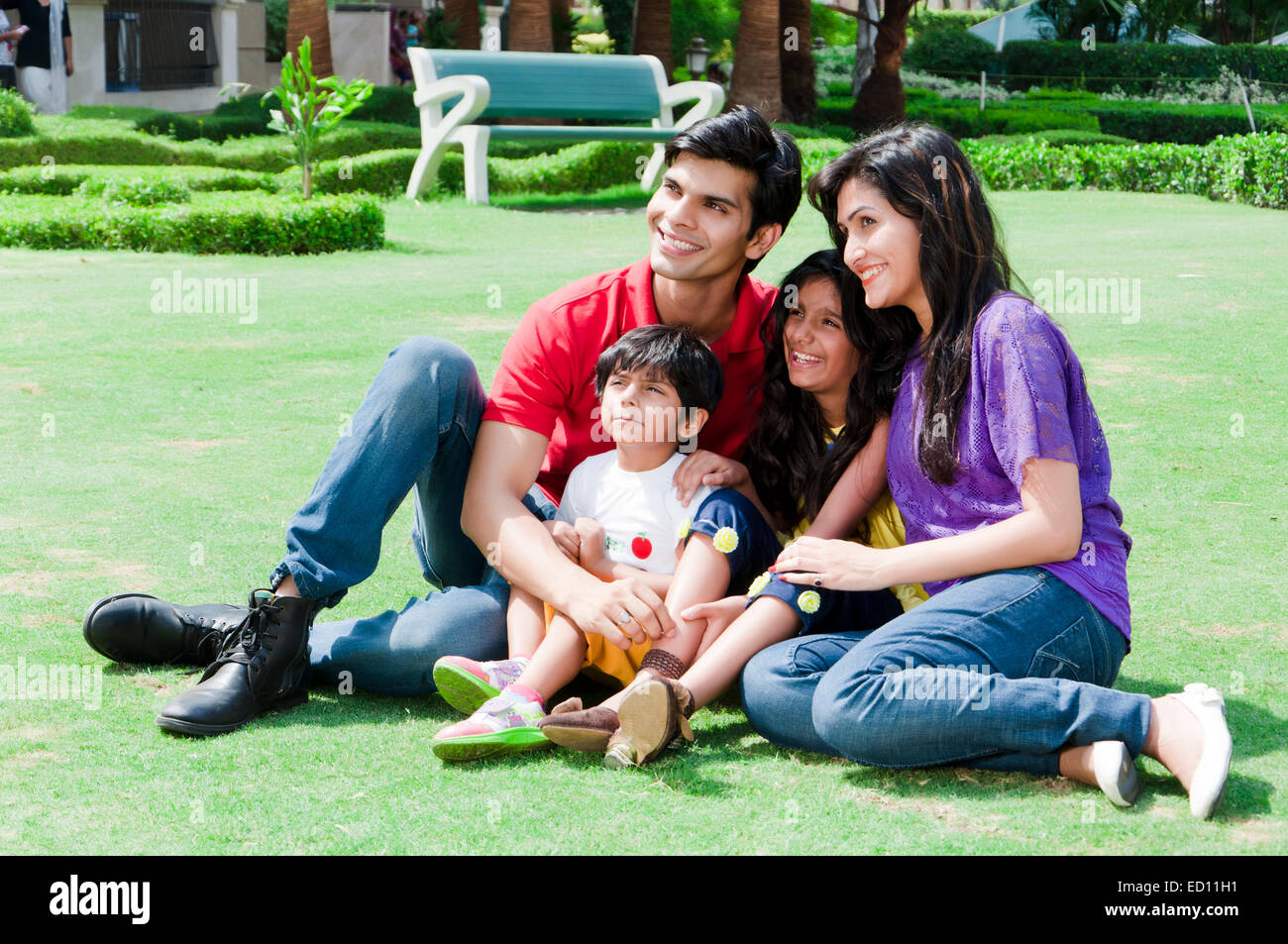 indian Parents with children park enjoy Stock Photo - Alamy
