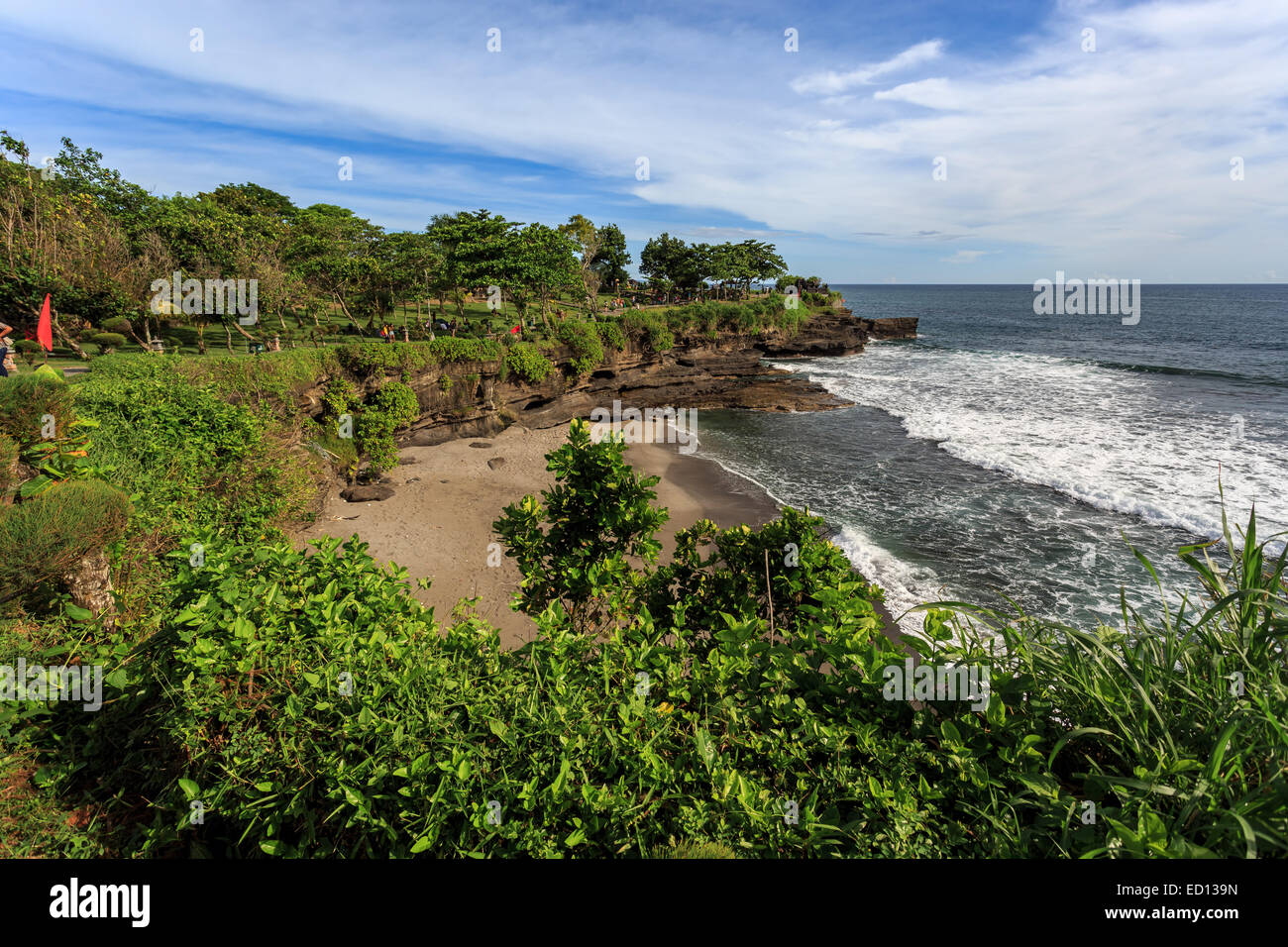 Coast near Tanah Lot at sunny day, Bali, Indonesia Stock Photo - Alamy