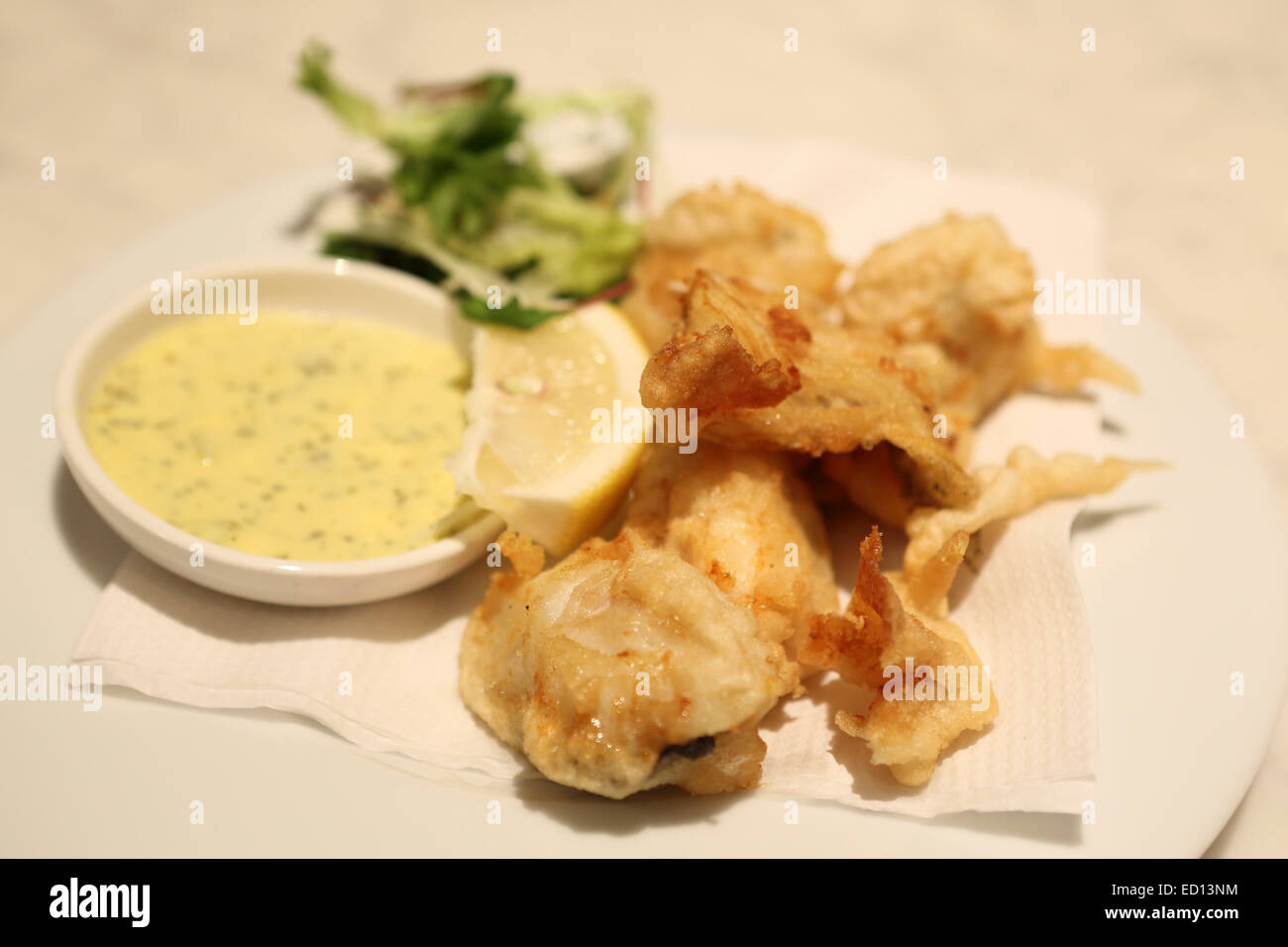 Kibbeling (deep fried cod) served with mustard-based ravigote sauce in ...