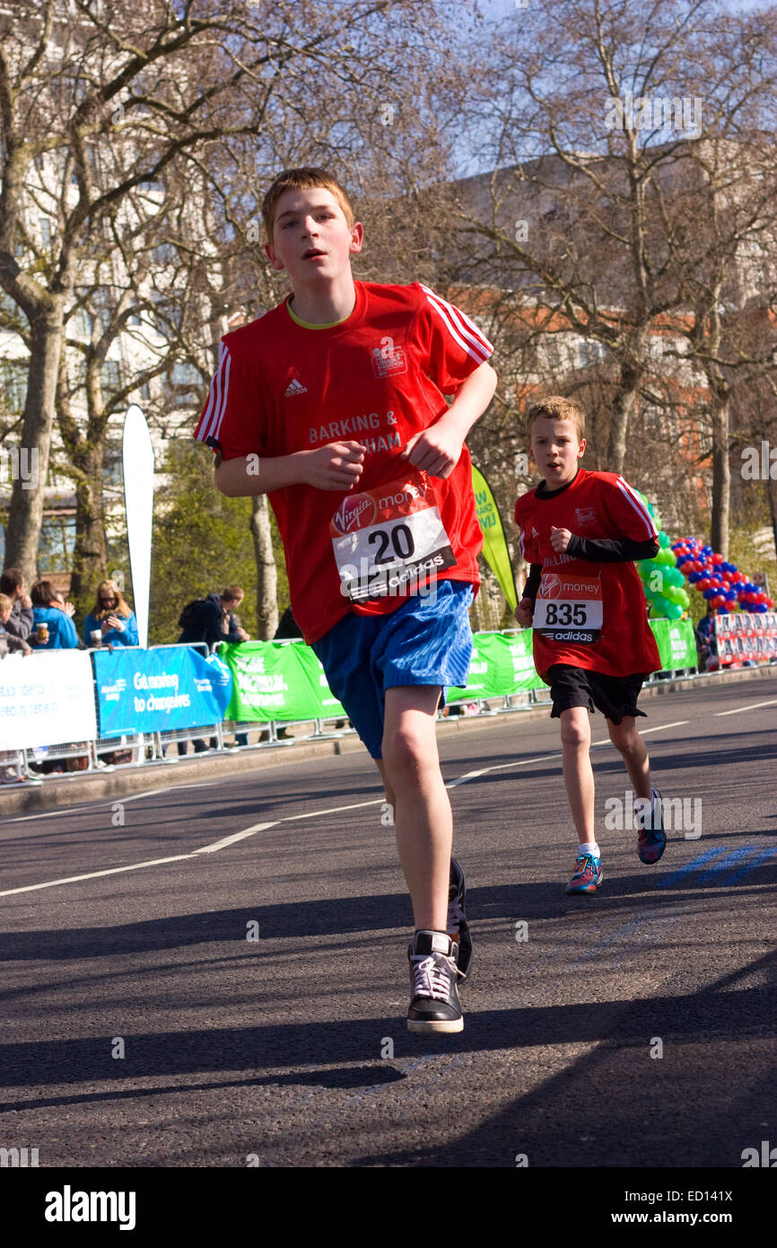 LONDON - APRIL 13: Unidentified children run the London marathon on ...