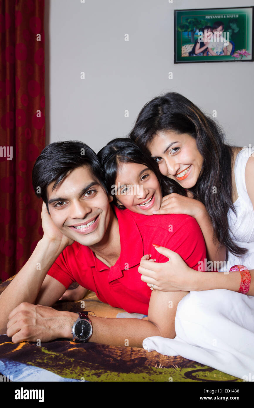 indian Parents with children home fun Stock Photo - Alamy