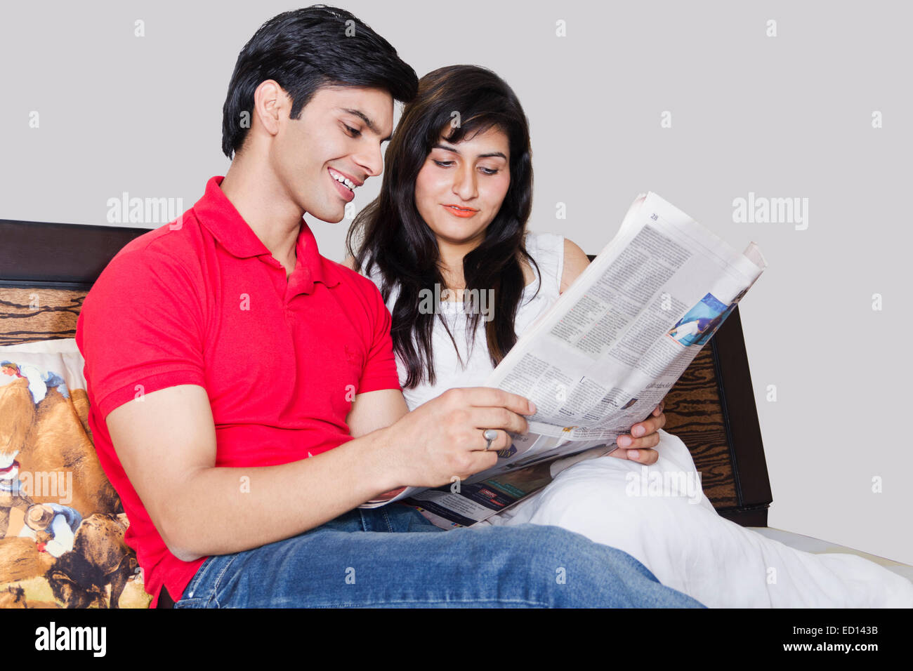Two people read newspaper hi-res stock photography and images - Alamy