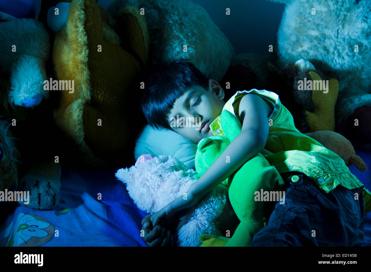 1 indian child boy Sleeping Bedroor Stock Photo - Alamy