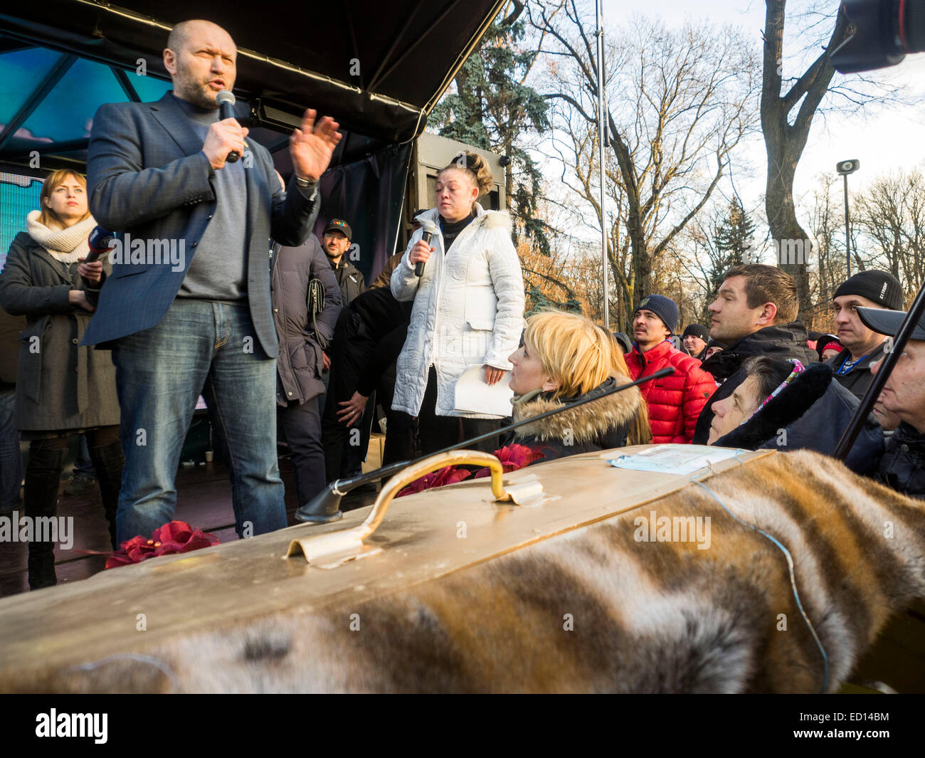 Kiev, Ukraine. 23rd Dec, 2014. Deputy Borislav Bereza tries to calm ...