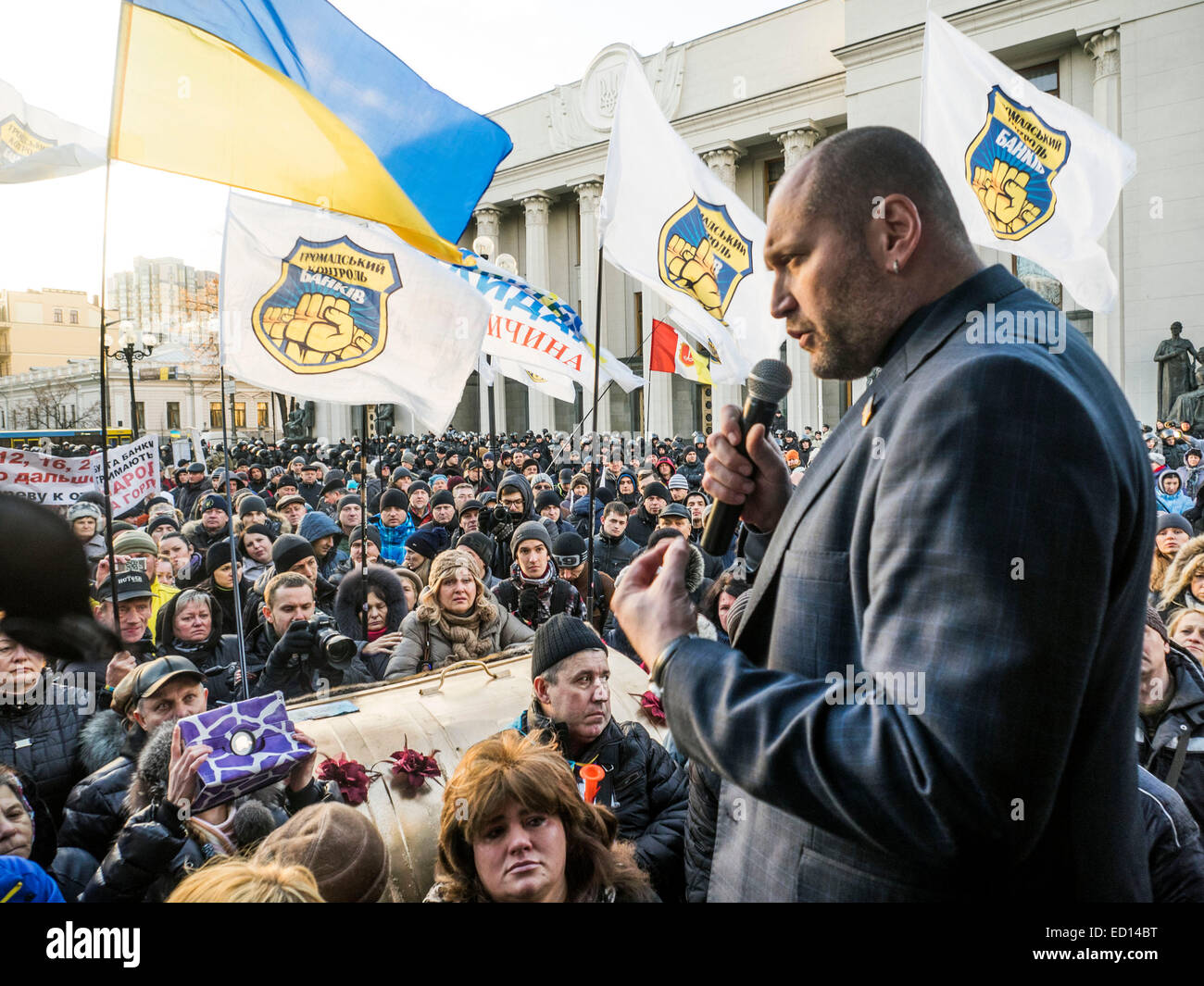 Kiev, Ukraine. 23rd Dec, 2014. Deputy Borislav Bereza tries to calm ...